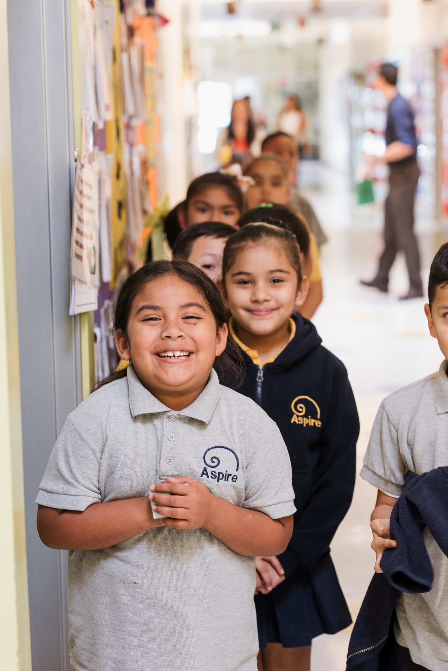 Titan students in a line in the hallway – Aspire Tate Academy