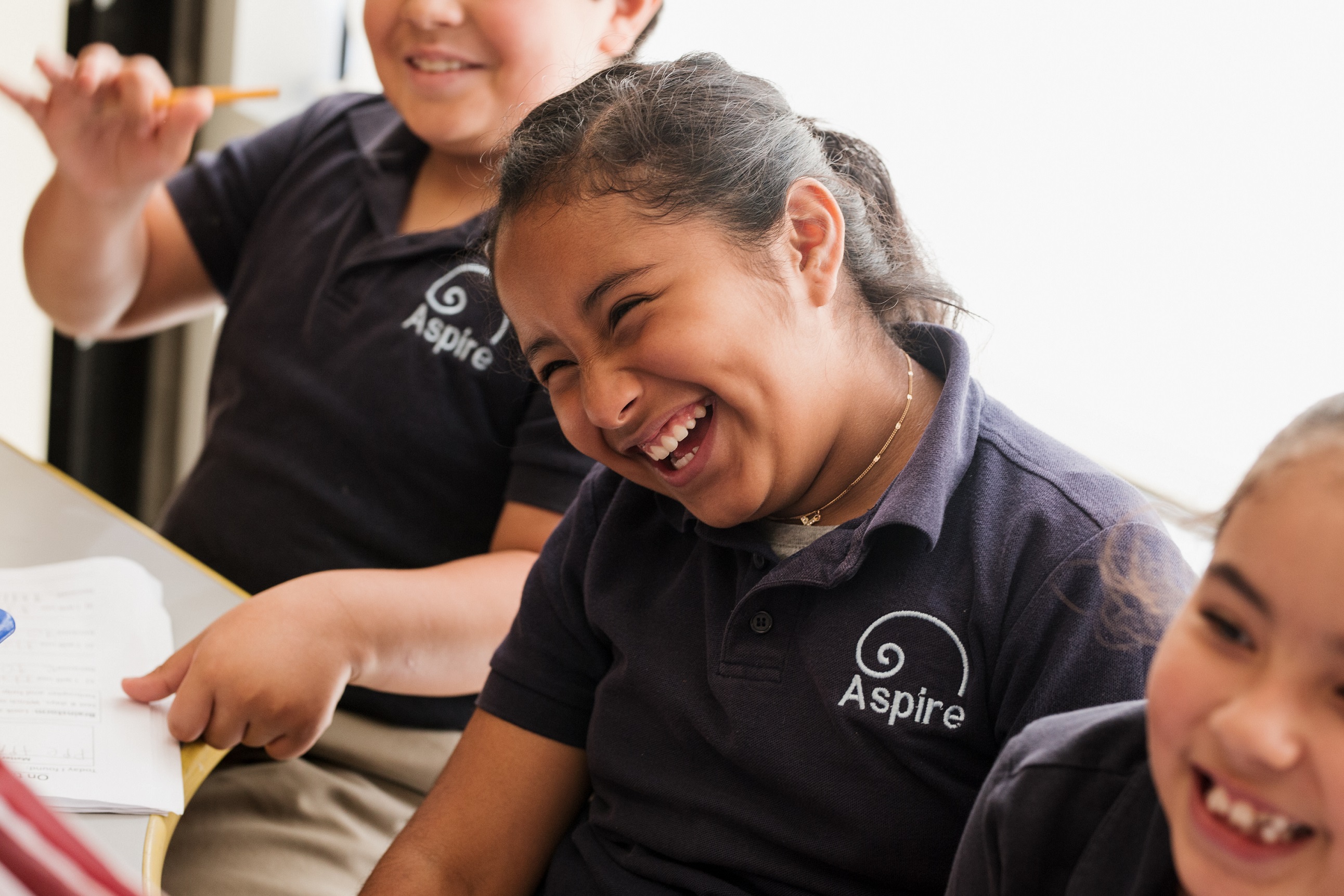 Titan students laughing – Aspire Tate Academy